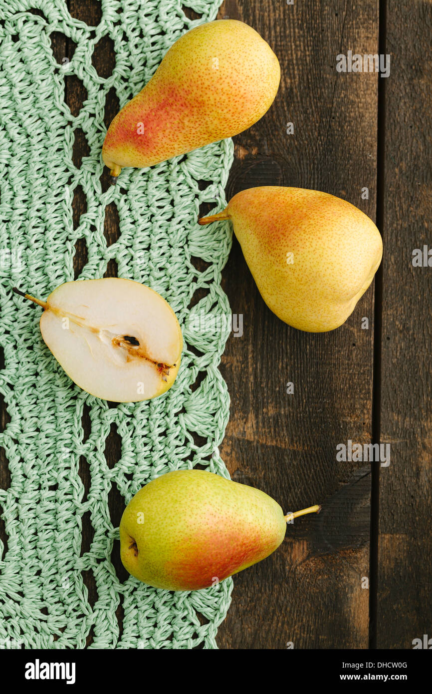 Three and a halved fresh pears Stock Photo - Alamy