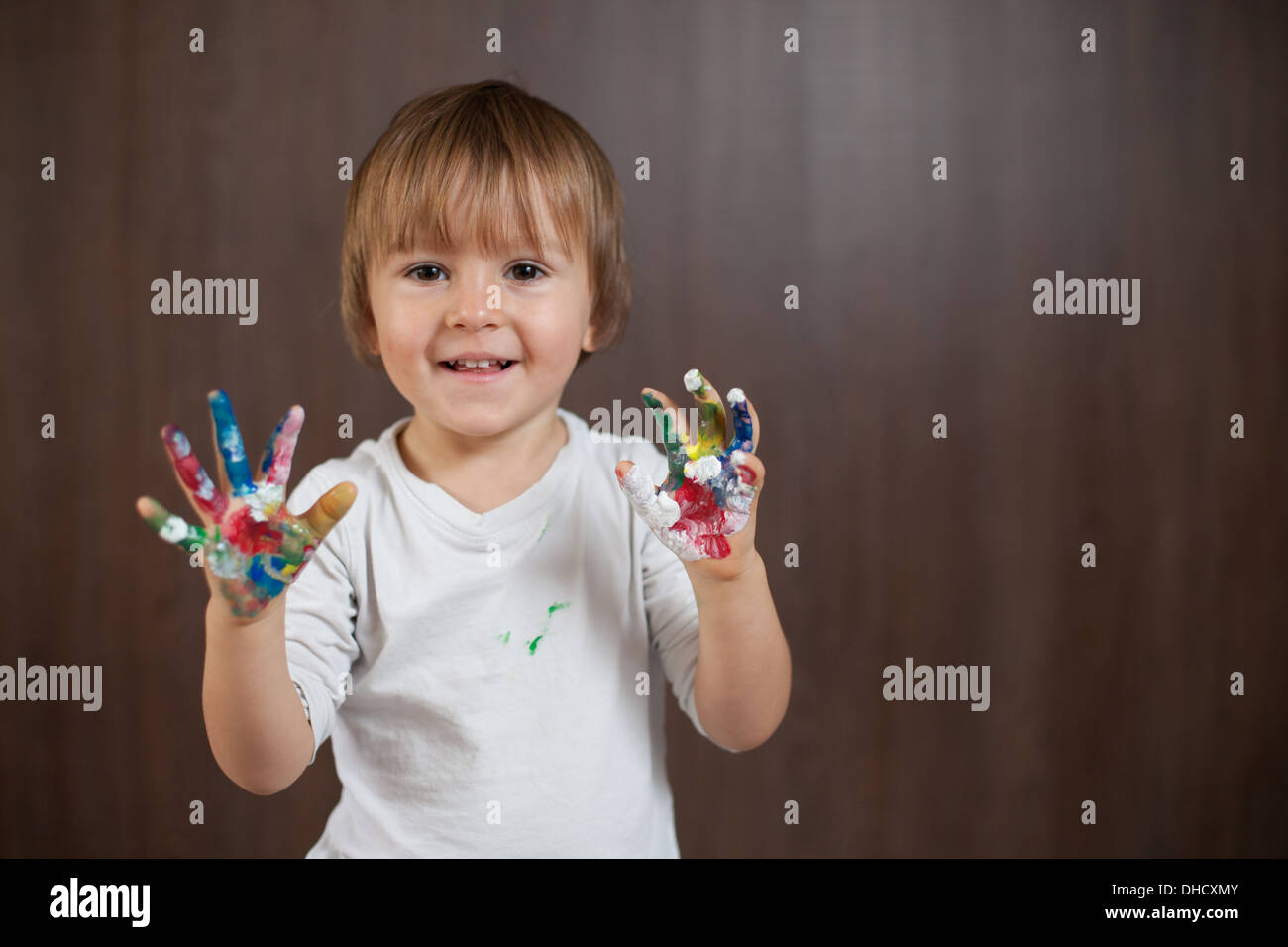 Cute boy with painted hands Stock Photo - Alamy