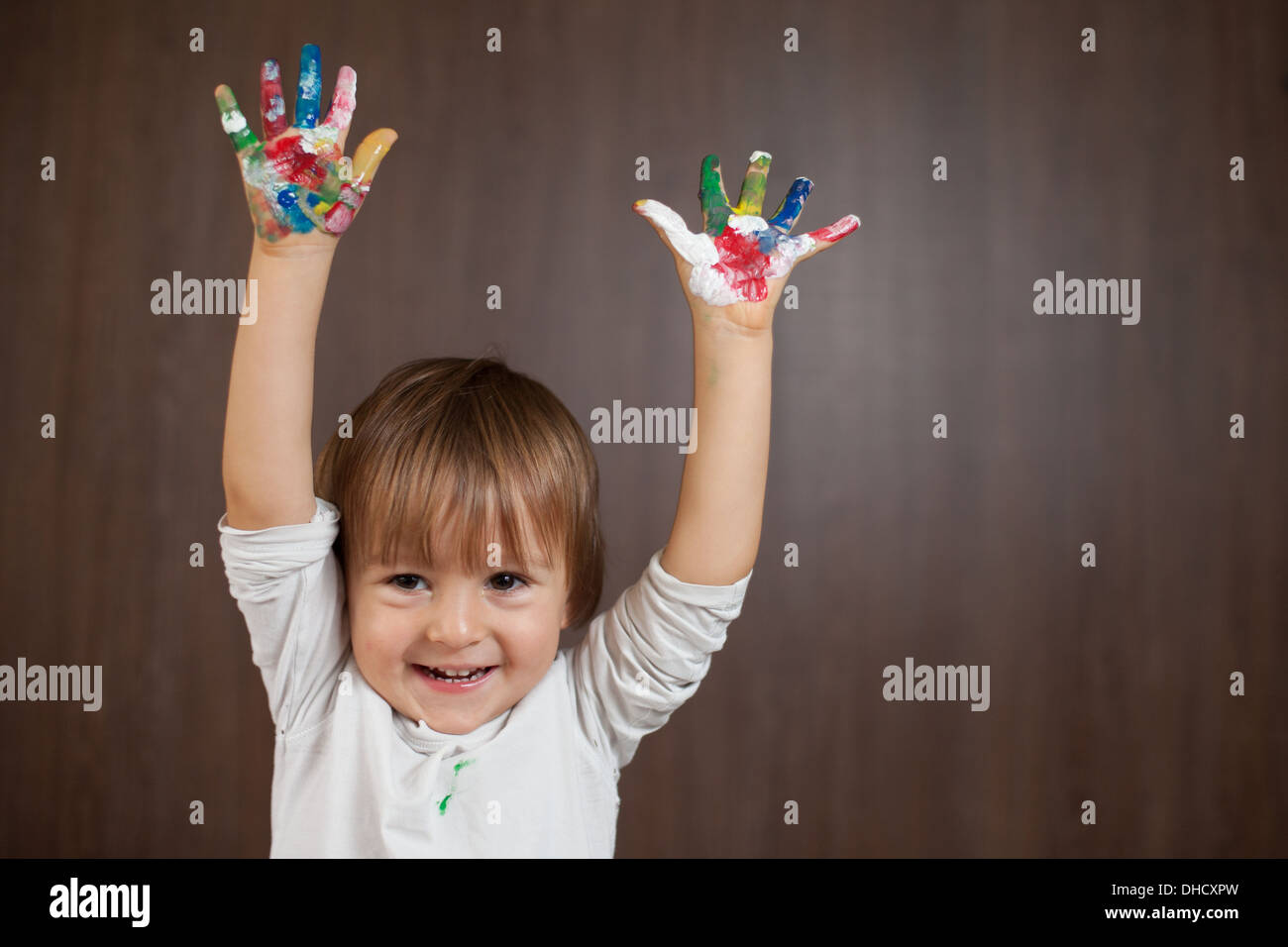 Cute boy with painted hands Stock Photo - Alamy