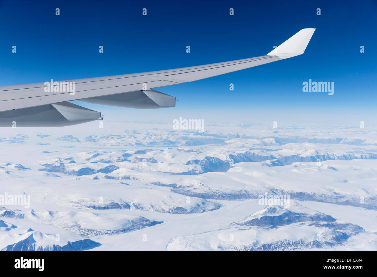 Aeroplane flying over Greenland ice sheet Stock Photo - Alamy
