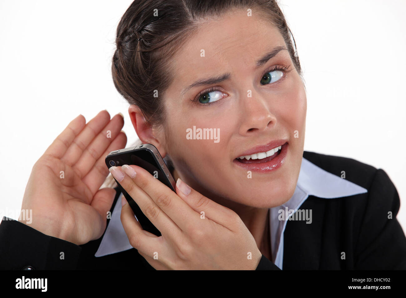 Woman straining ear hi-res stock photography and images - Alamy