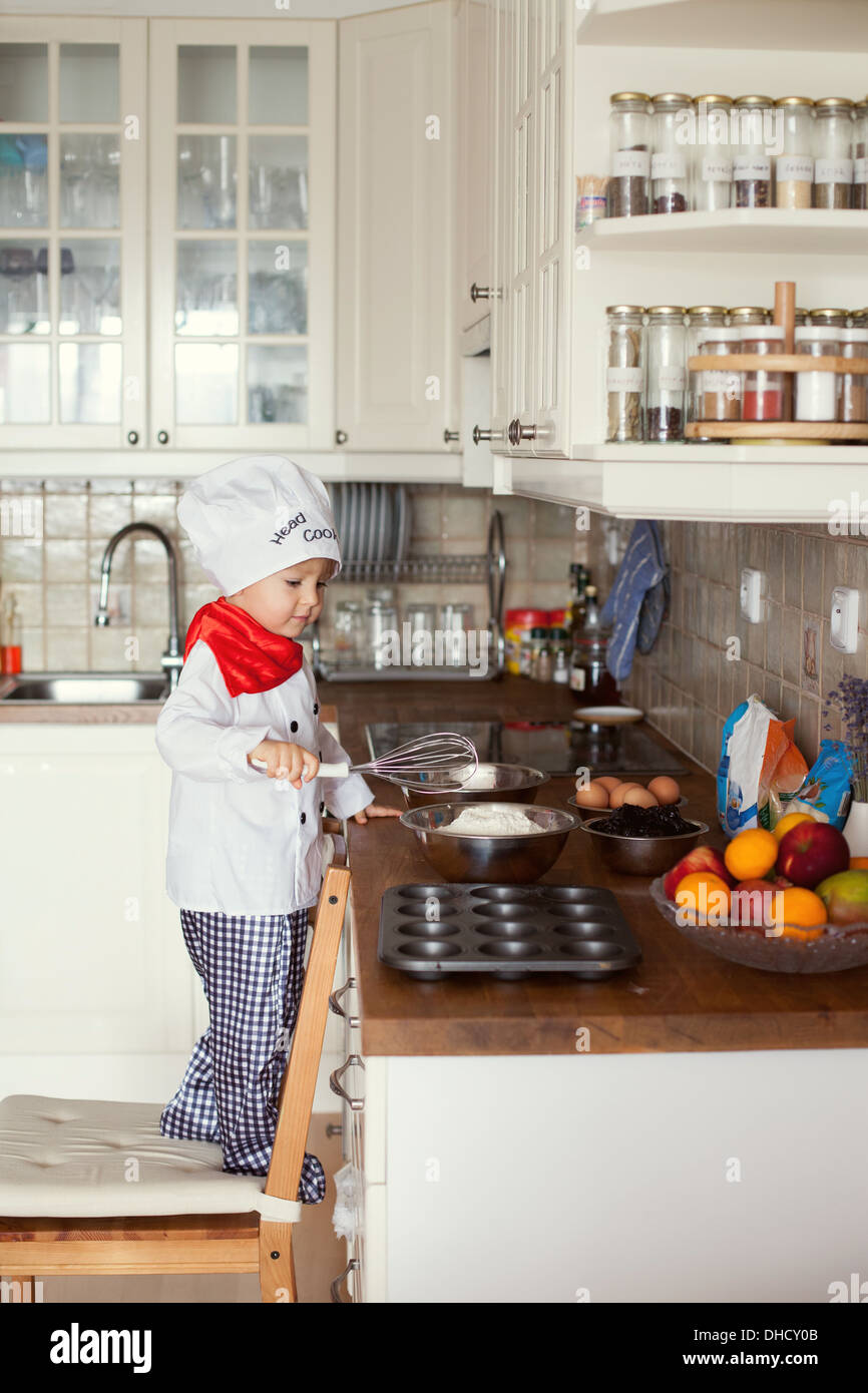 Boy in the kitchen, baking Stock Photo - Alamy