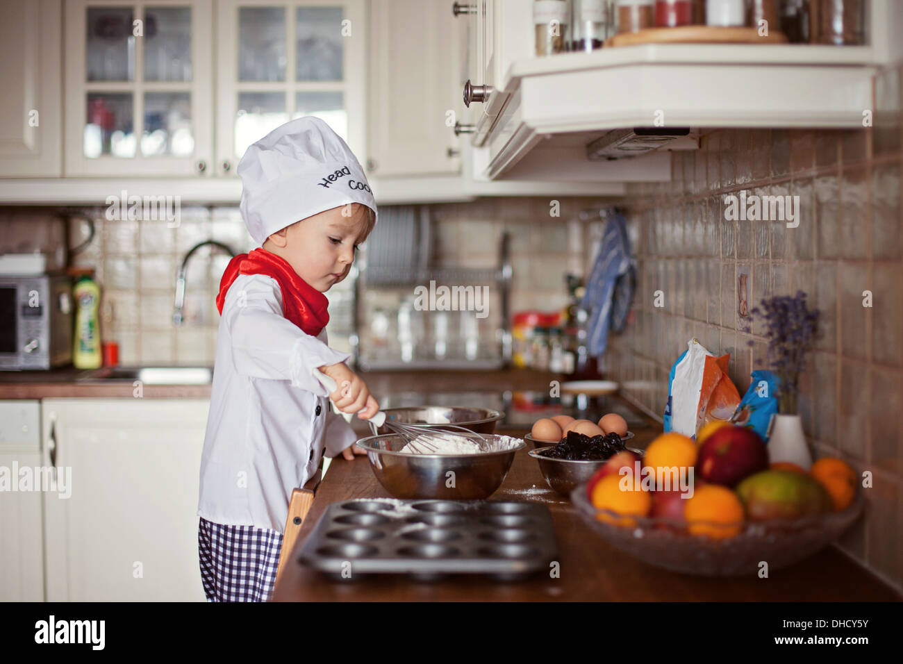 Boy in the kitchen, baking Stock Photo - Alamy