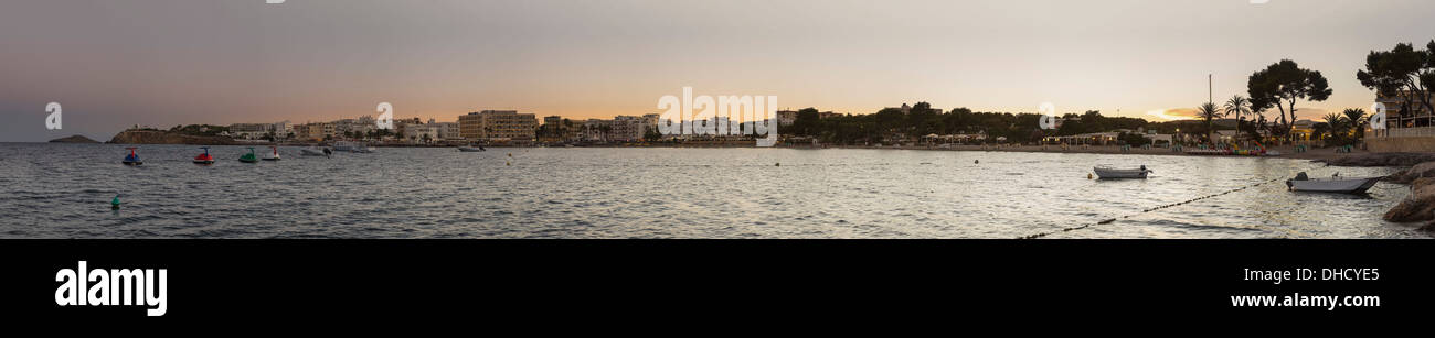 Spain, Ibiza, Beach of Es Canar during sunset Stock Photo - Alamy