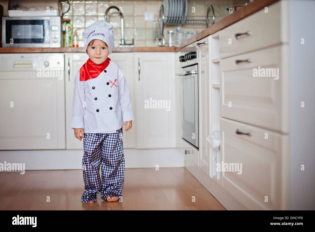 Boy in the kitchen, baking Stock Photo - Alamy