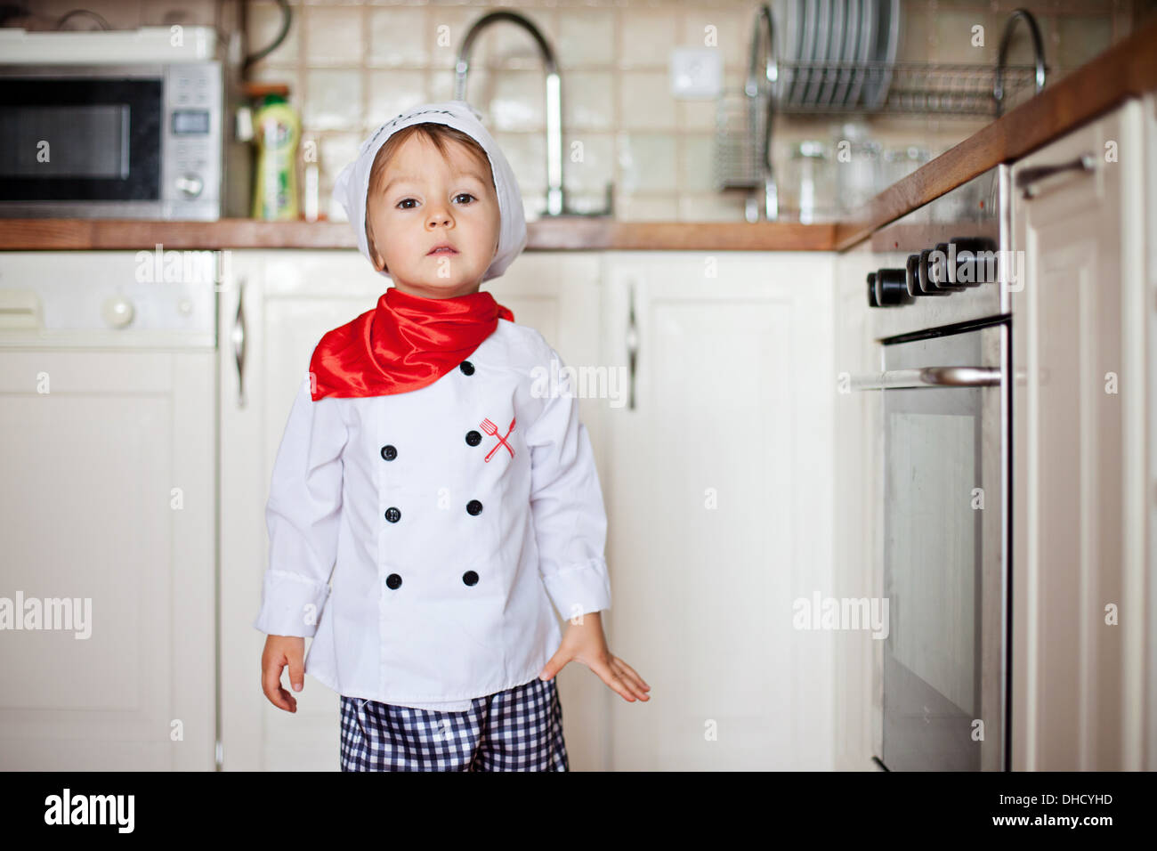 Boy in a kitchen Stock Photo - Alamy