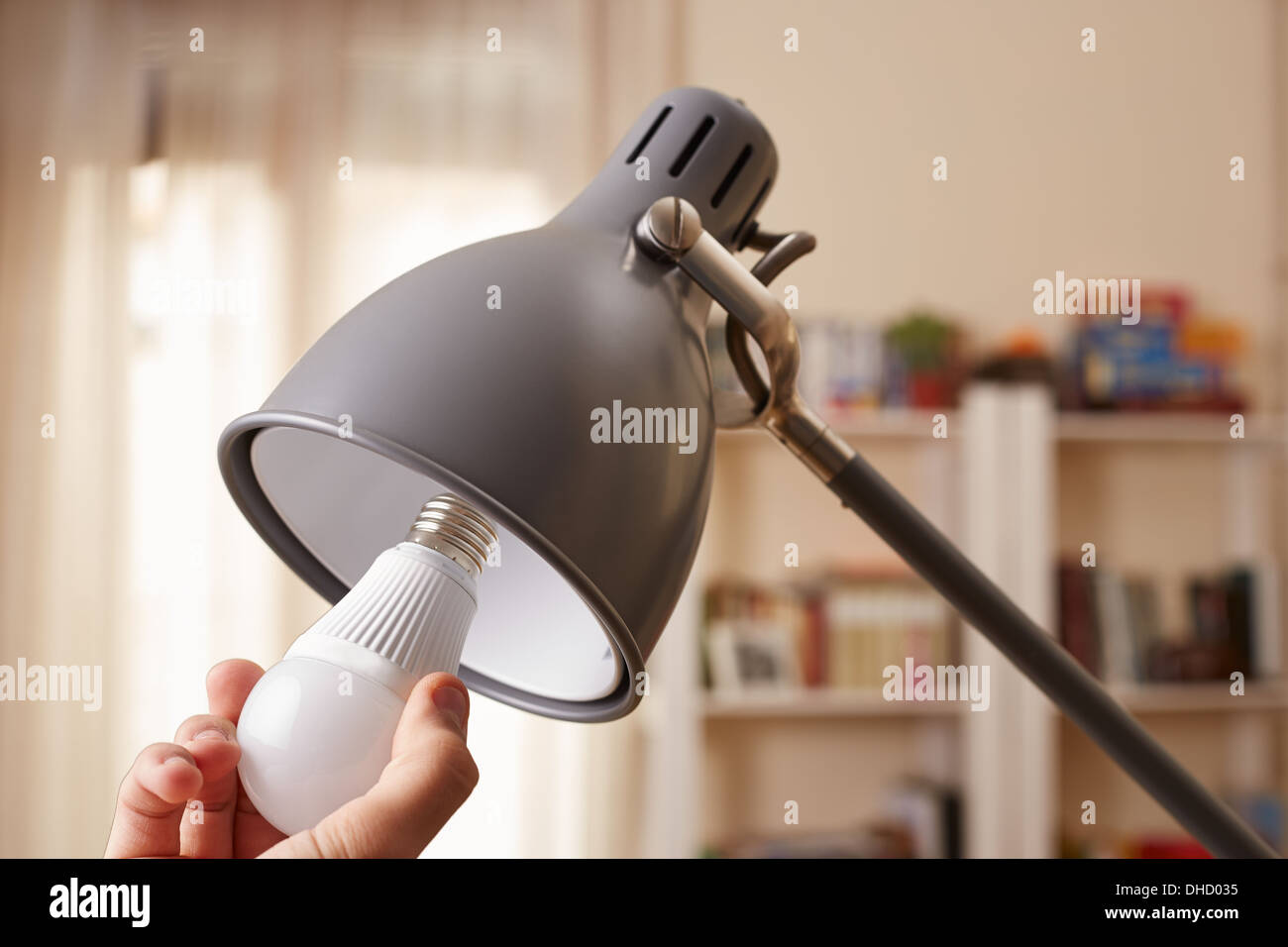 Changing light bulb hi-res stock photography and images - Alamy