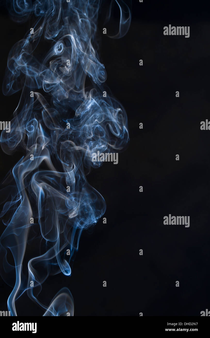 Blue smoke from incense stick Stock Photo - Alamy