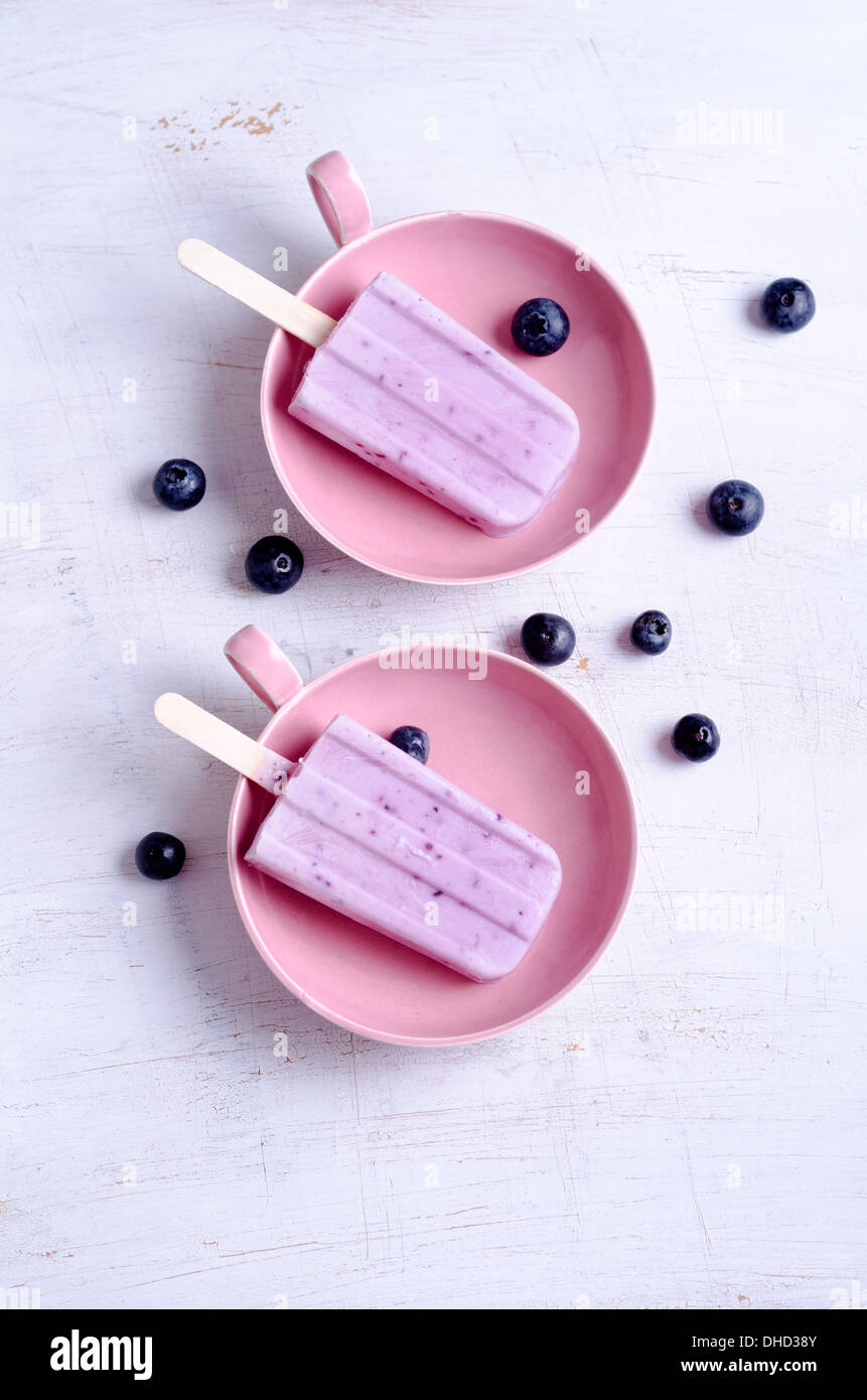 Homemade blueberry ice lollies Stock Photo - Alamy