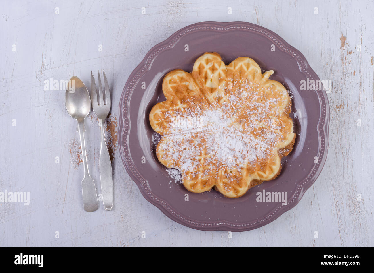 Heart-shaped waffle with icing sugar Stock Photo - Alamy