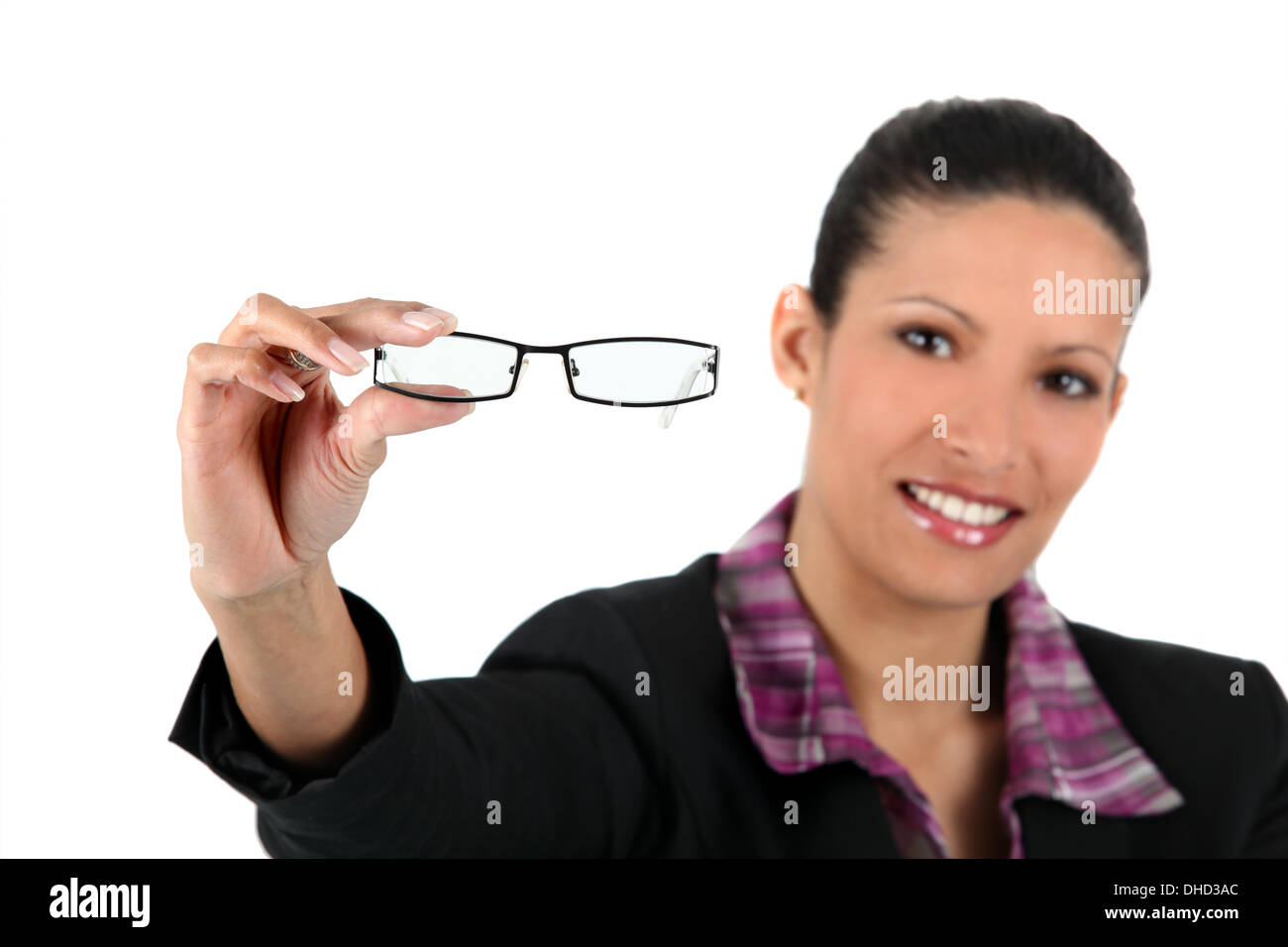 Woman holding her glasses far Stock Photo - Alamy