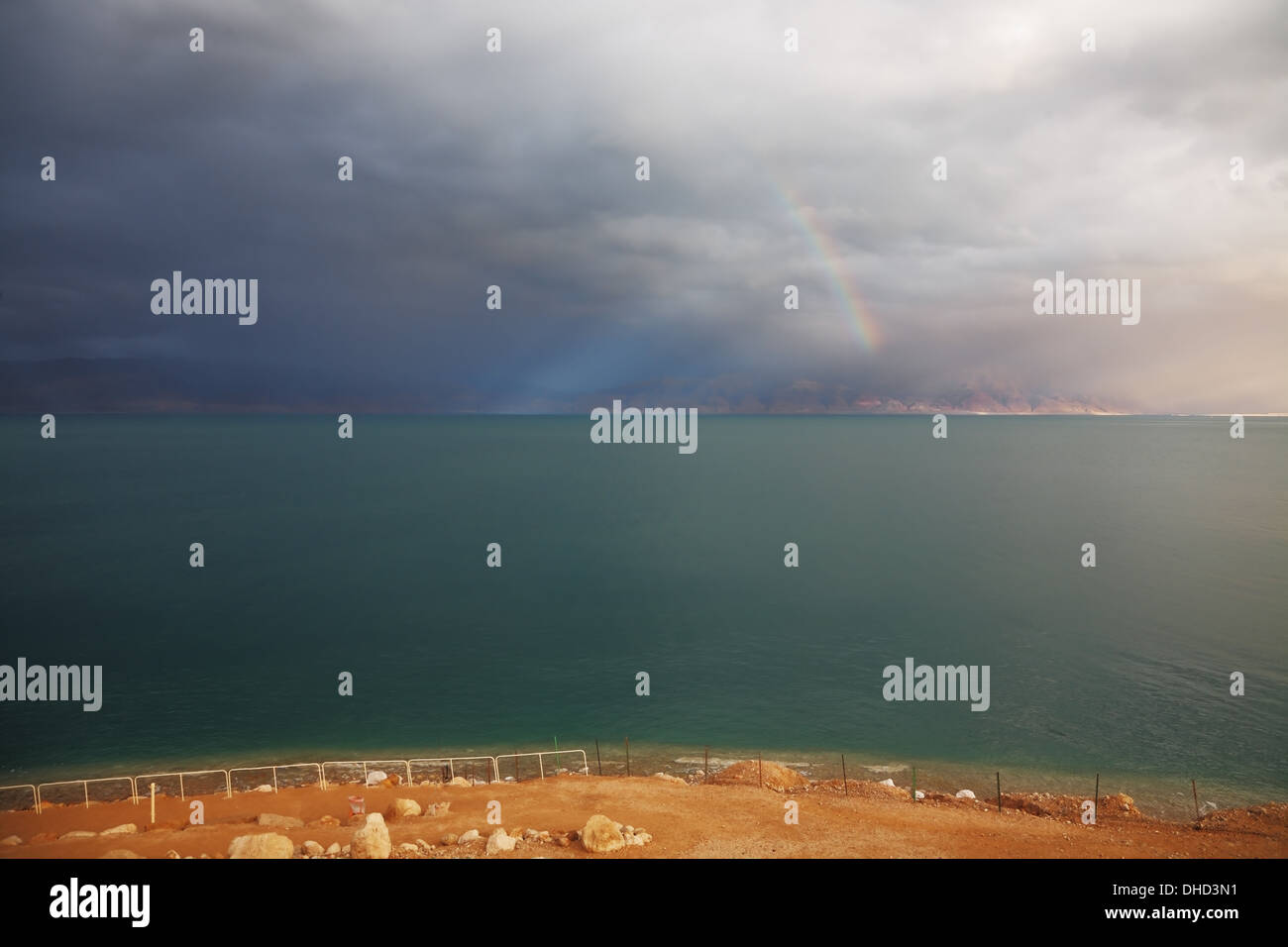 Blue storm cloud and magnificent rainbow Stock Photo - Alamy