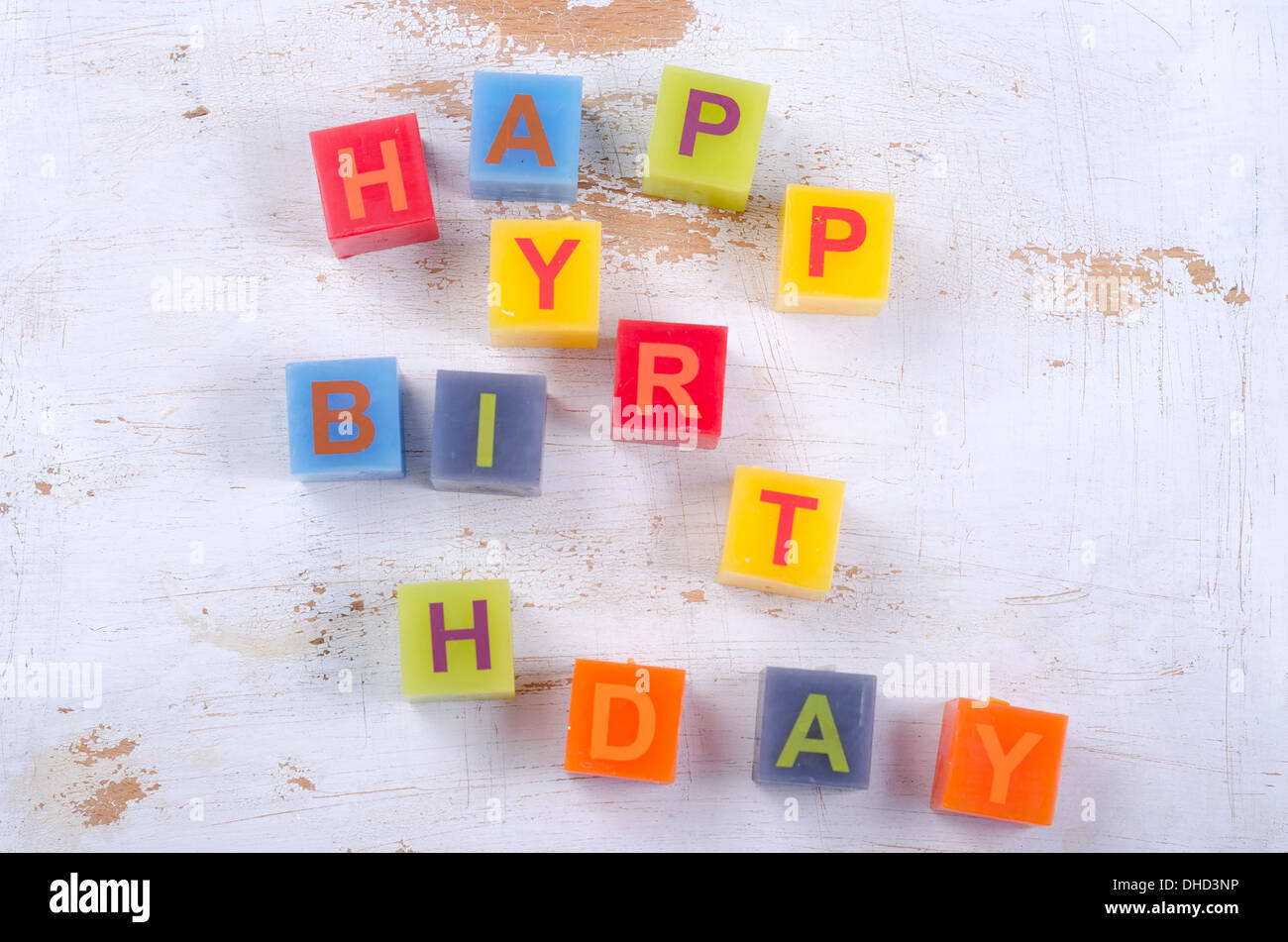 Happy birthday, little cubes on wooden table Stock Photo - Alamy
