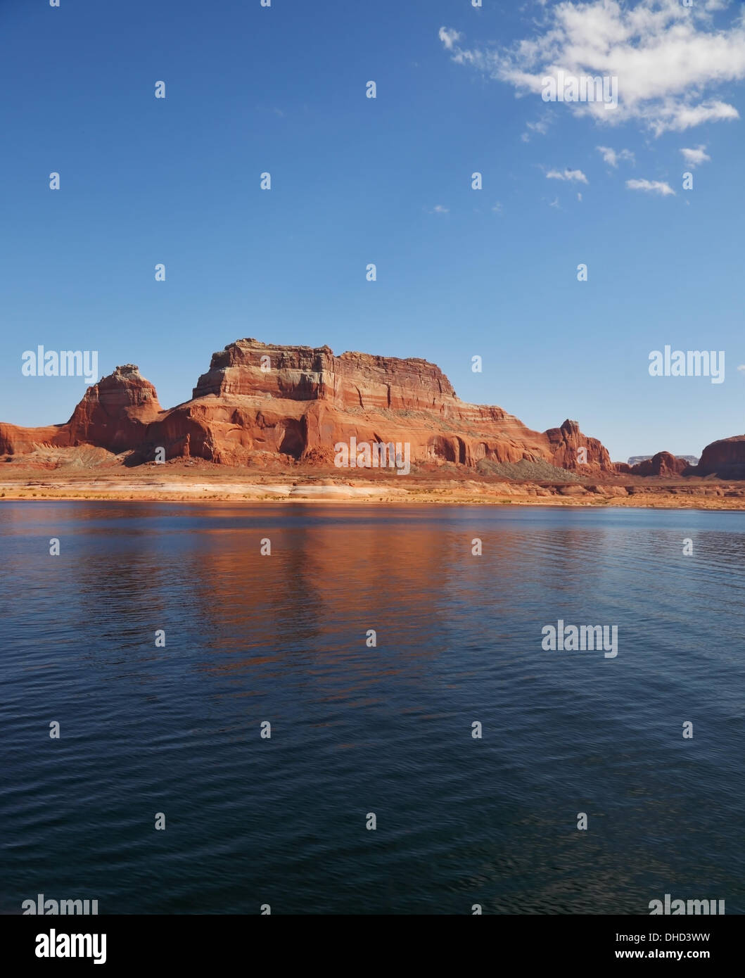 Red cliffs reflected in the smooth water Stock Photo - Alamy