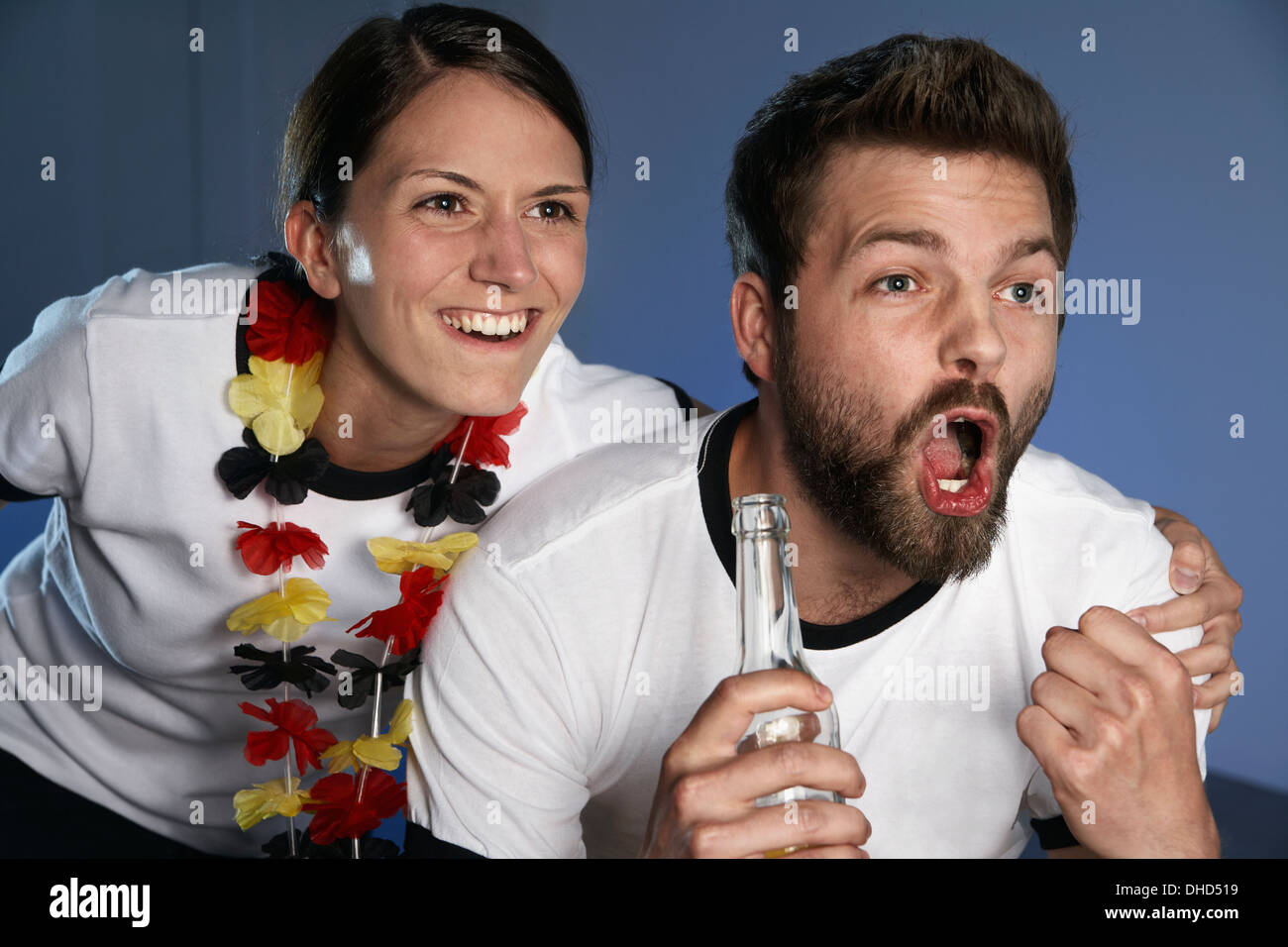 Two excited soccer fans Stock Photo - Alamy