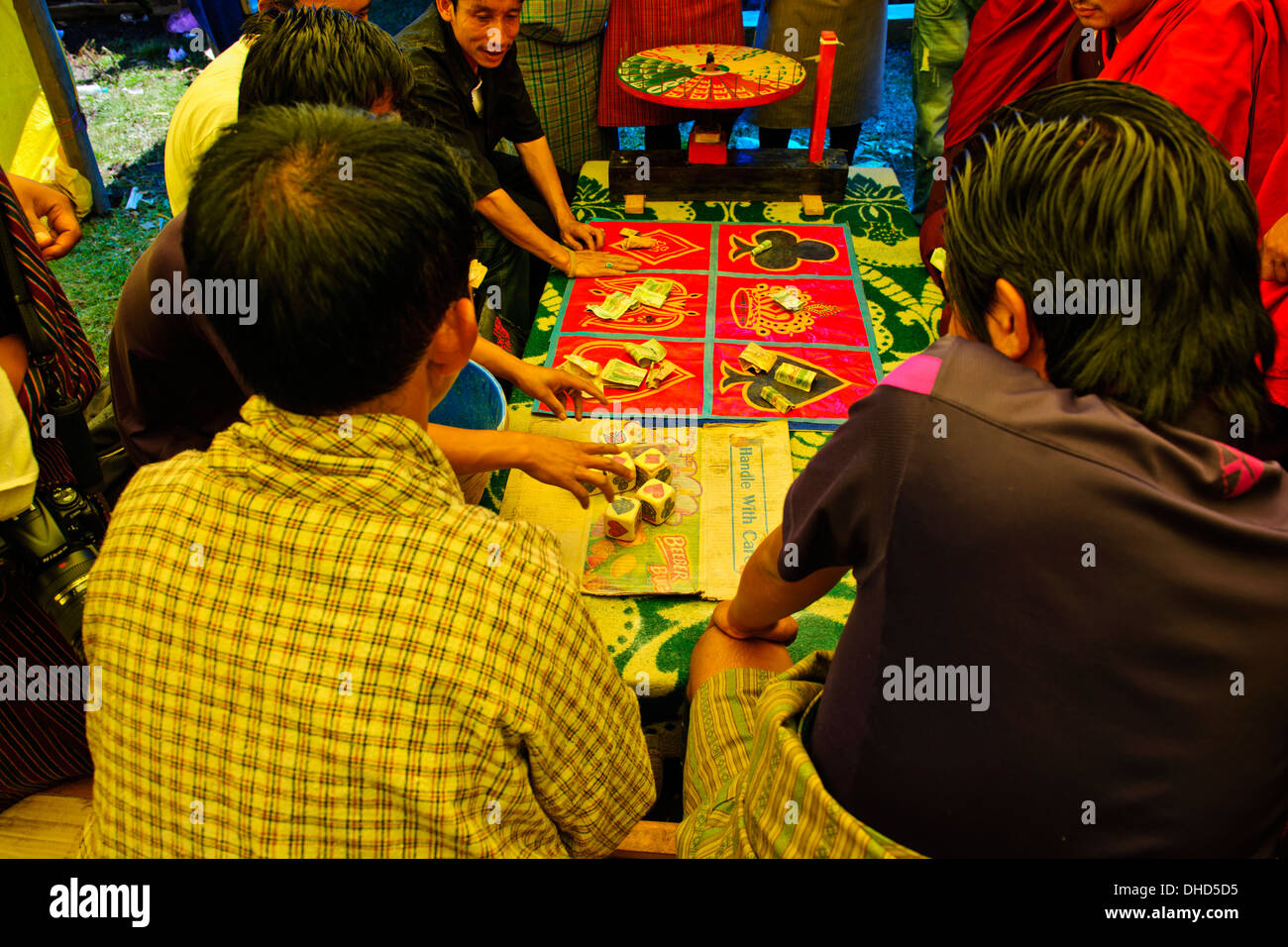 Lago Lago Big Dice Game Gambling Monks People In Traditional Festival Tsechu Costume Thankabi lago-lago-big-dice-game-gambling-monks-people-in-traditional-festival-tsechu-costume-thankabi