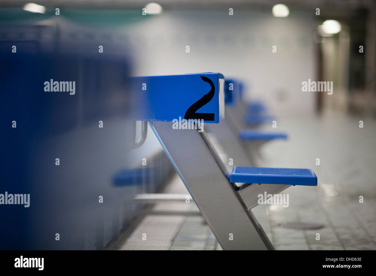 Starting blocks at indoor swimming pool Stock Photo - Alamy