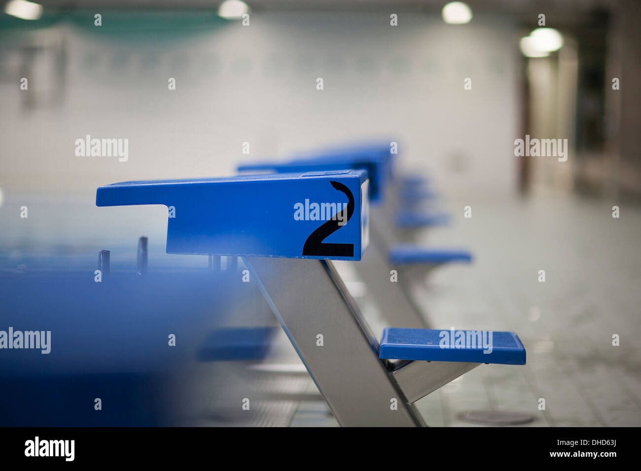 Starting blocks at indoor swimming pool Stock Photo - Alamy