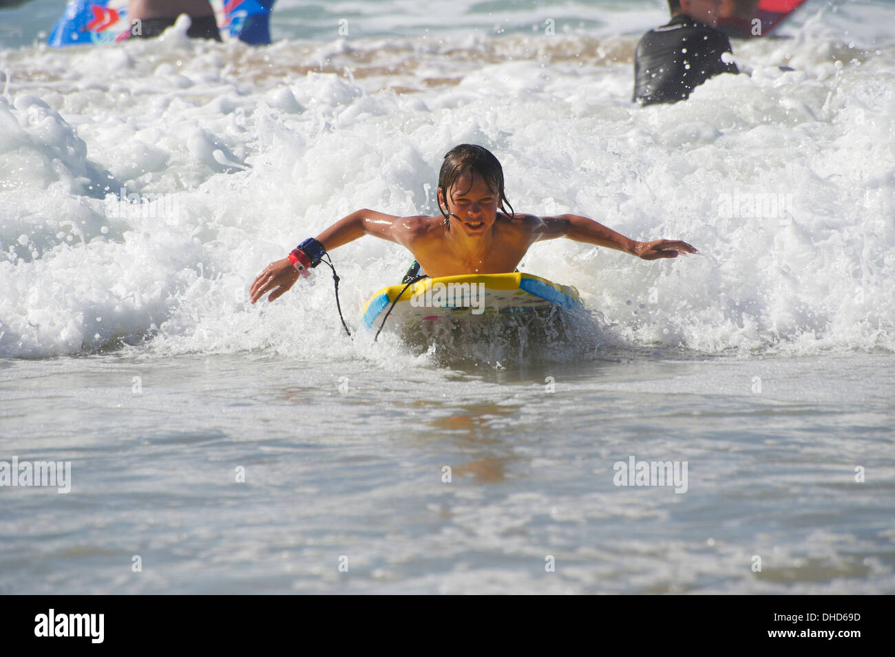 Boy Body boarding in the sea on the beach in Bidart on the Atlantic ...