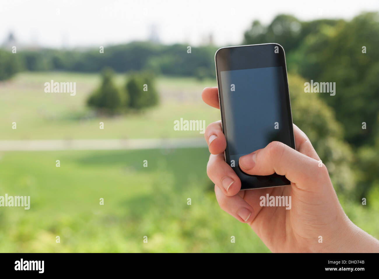 Hand holding smartphone Stock Photo - Alamy