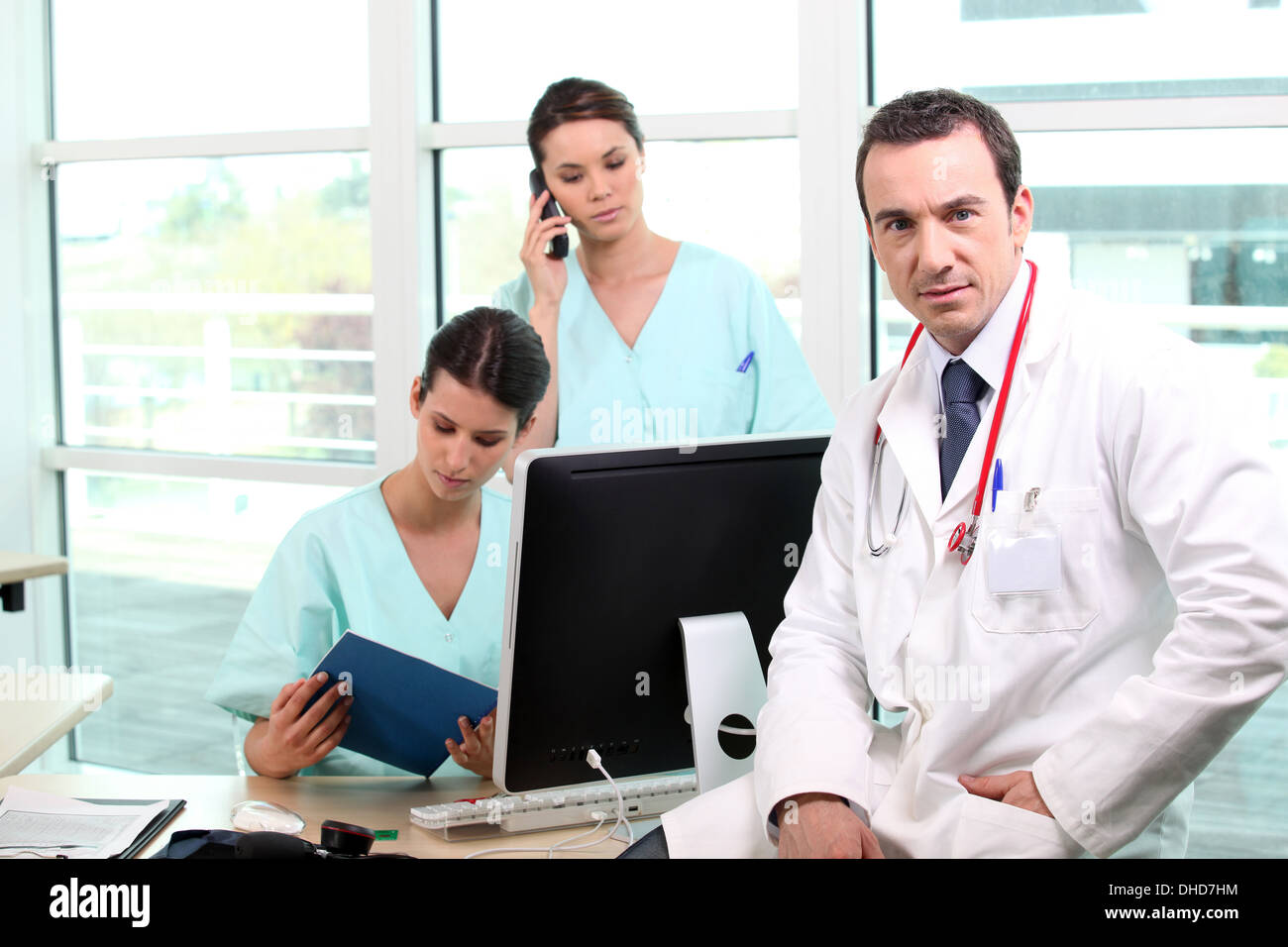 Doctor and nurses Stock Photo - Alamy