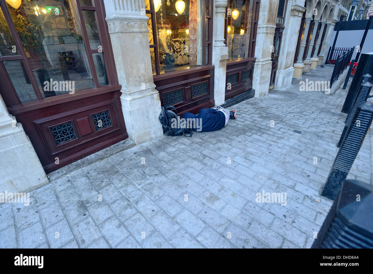 Homeless sleeping in a street Stock Photo - Alamy