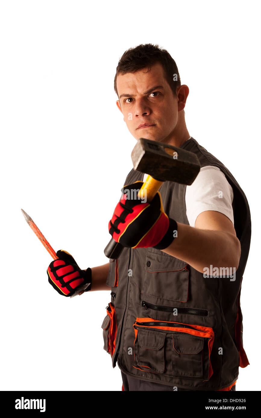 Angry construction worker threats with hamer Stock Photo - Alamy