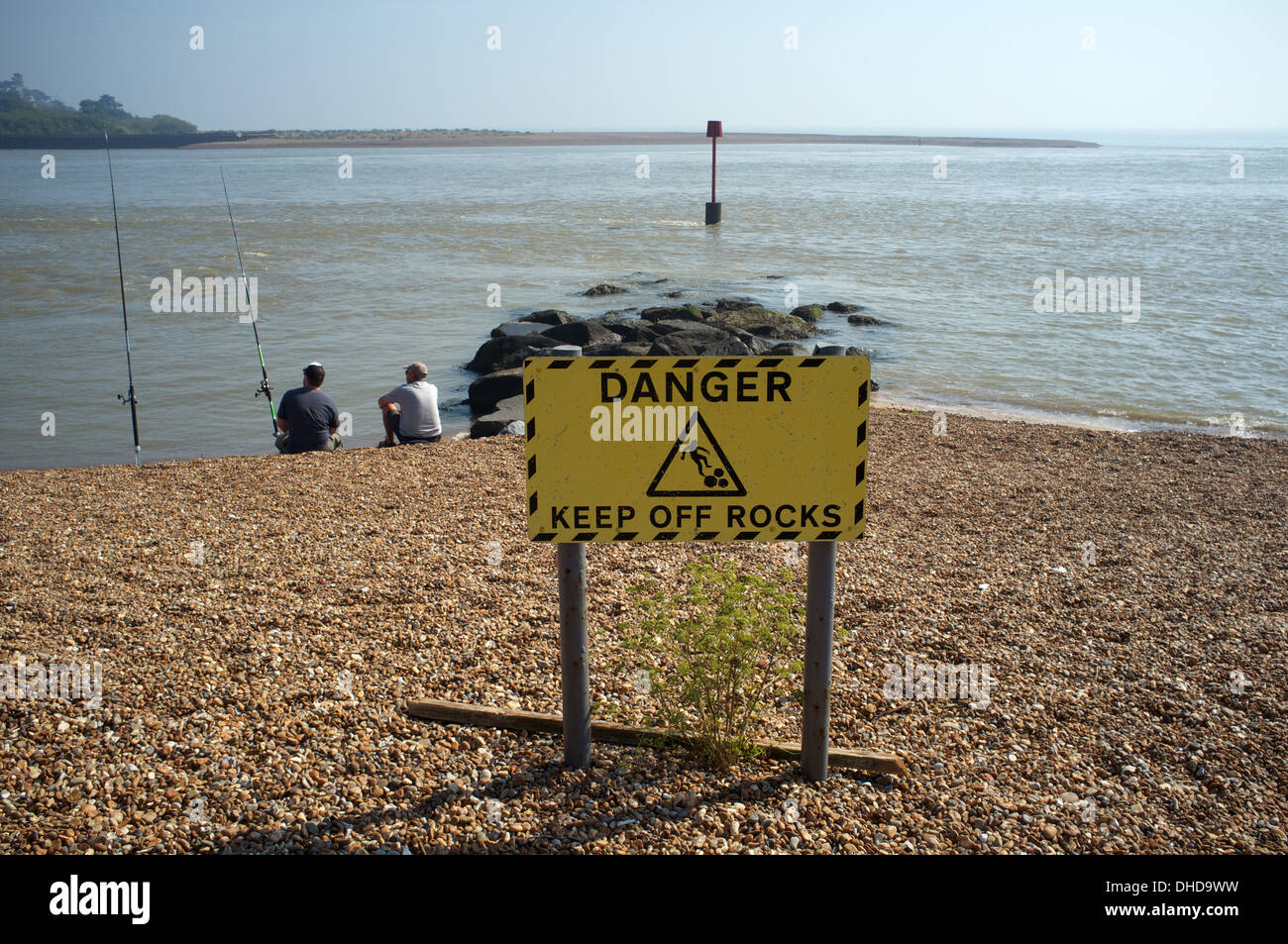 Danger keep off rocks sign, river Deben, Felixstowe Ferry, Suffolk, UK ...