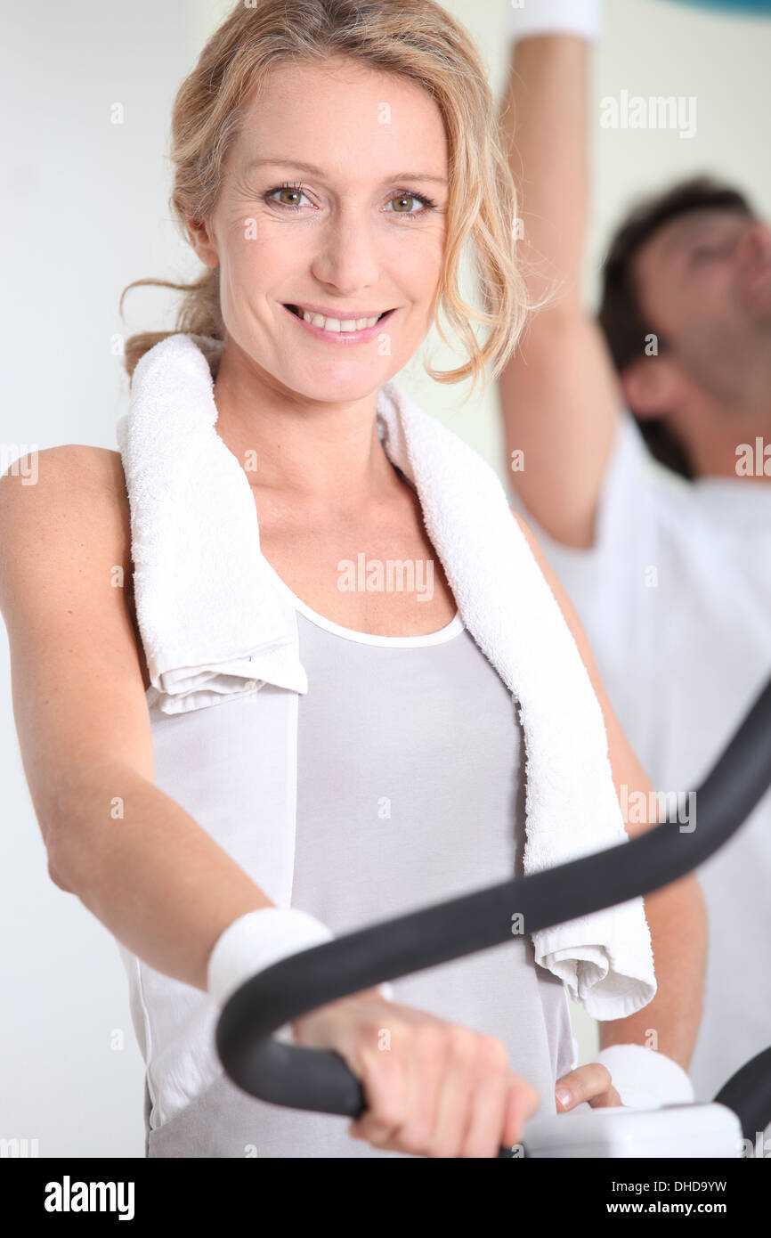 Working out in a gym Stock Photo - Alamy