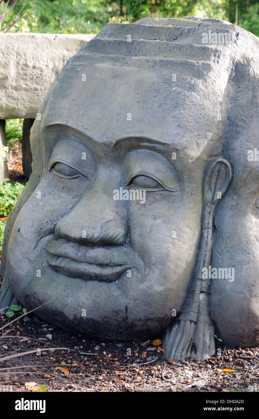 Head statue carved from stone Stock Photo - Alamy