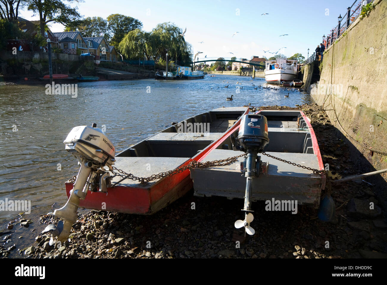 Grounded boat / boats on the beach / riverbank / bed / riverbed / bank ...