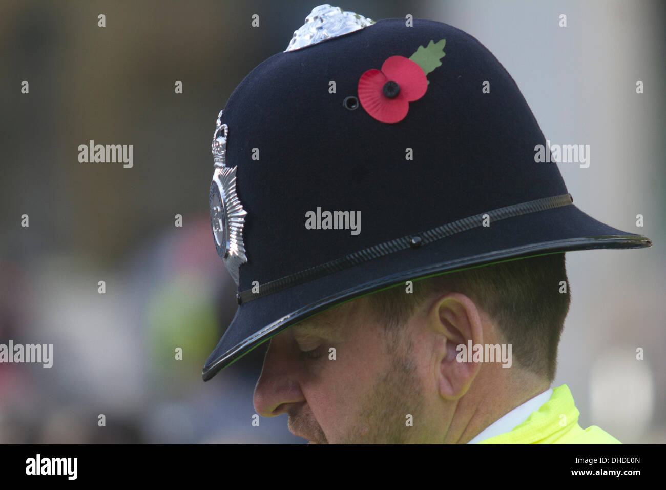 Westminster London, UK. 7th November 2013. A police officer wears a ...
