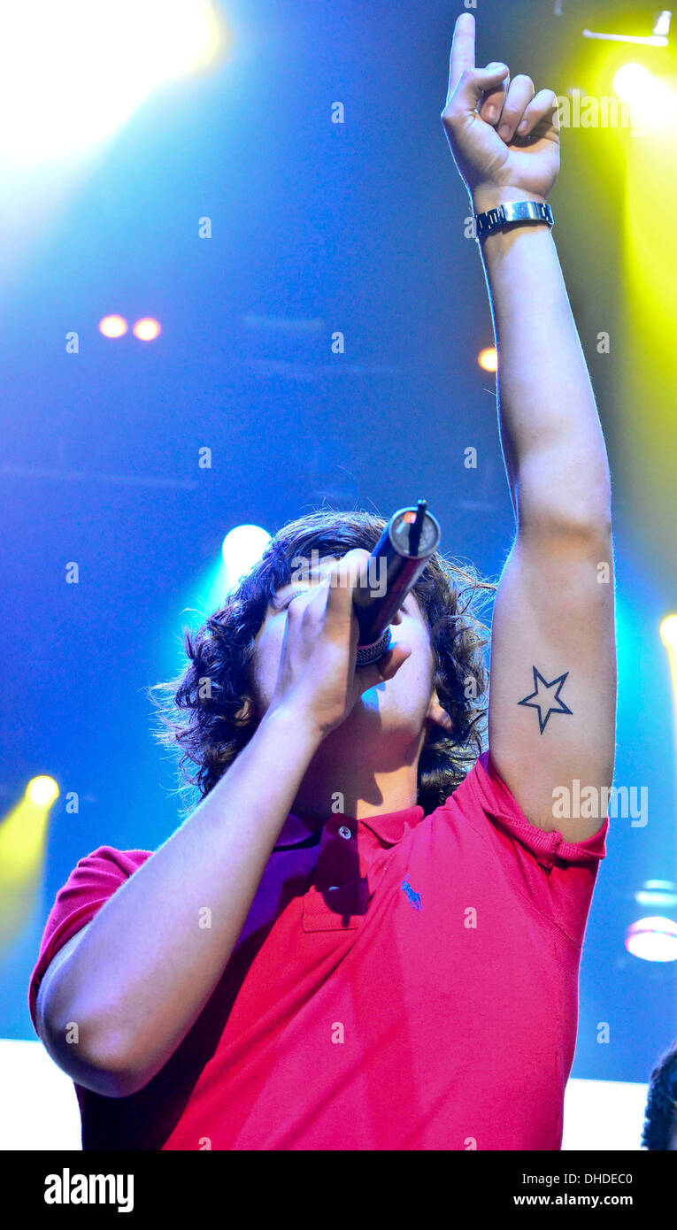 Harry Styles of One Direction performing in concert at St James Theatre ...