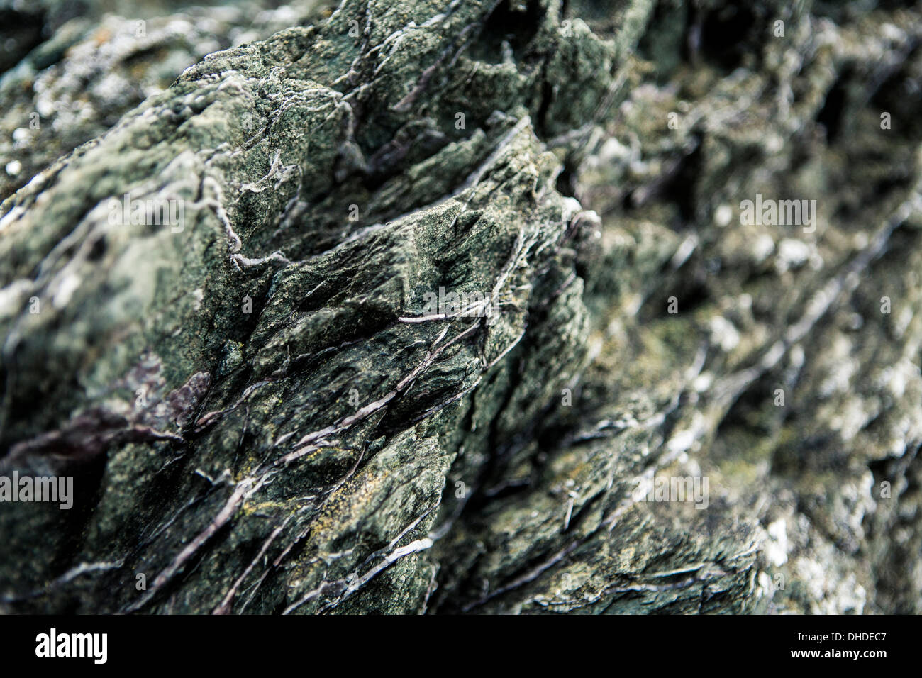 Abstract close up view of shards of quartz trapped in green stone Stock ...