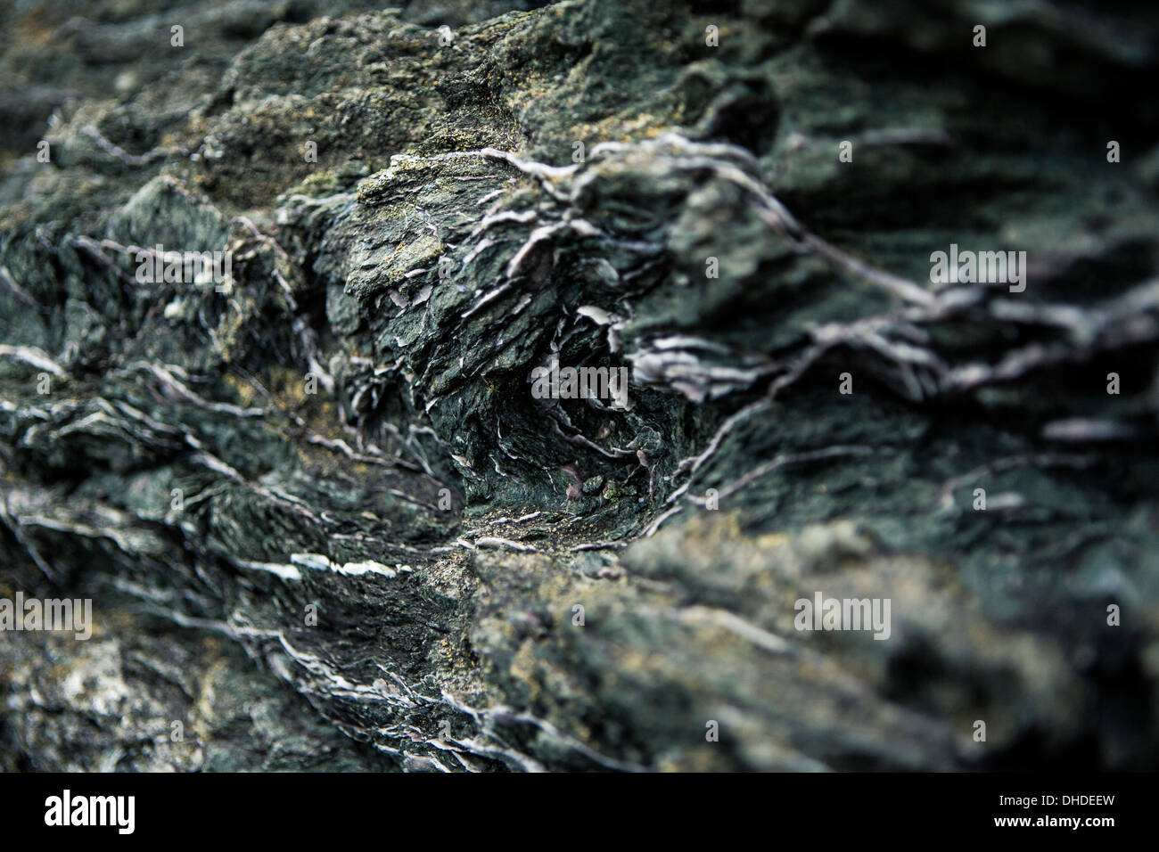 Abstract close up view of shards of quartz trapped in green stone Stock ...