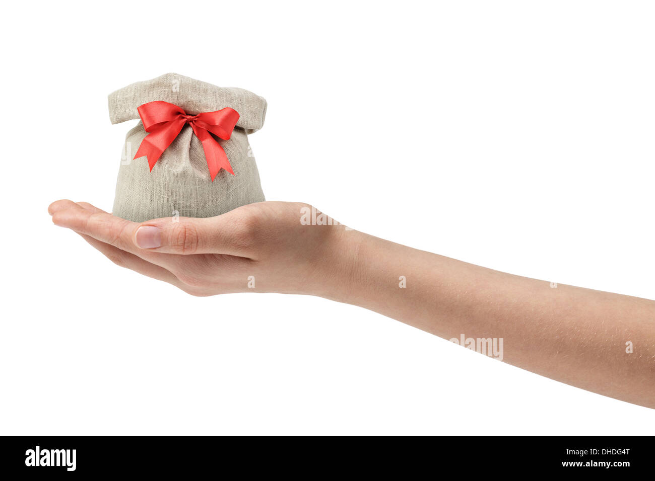 female teen hand holding sack back with present isolated on white Stock ...