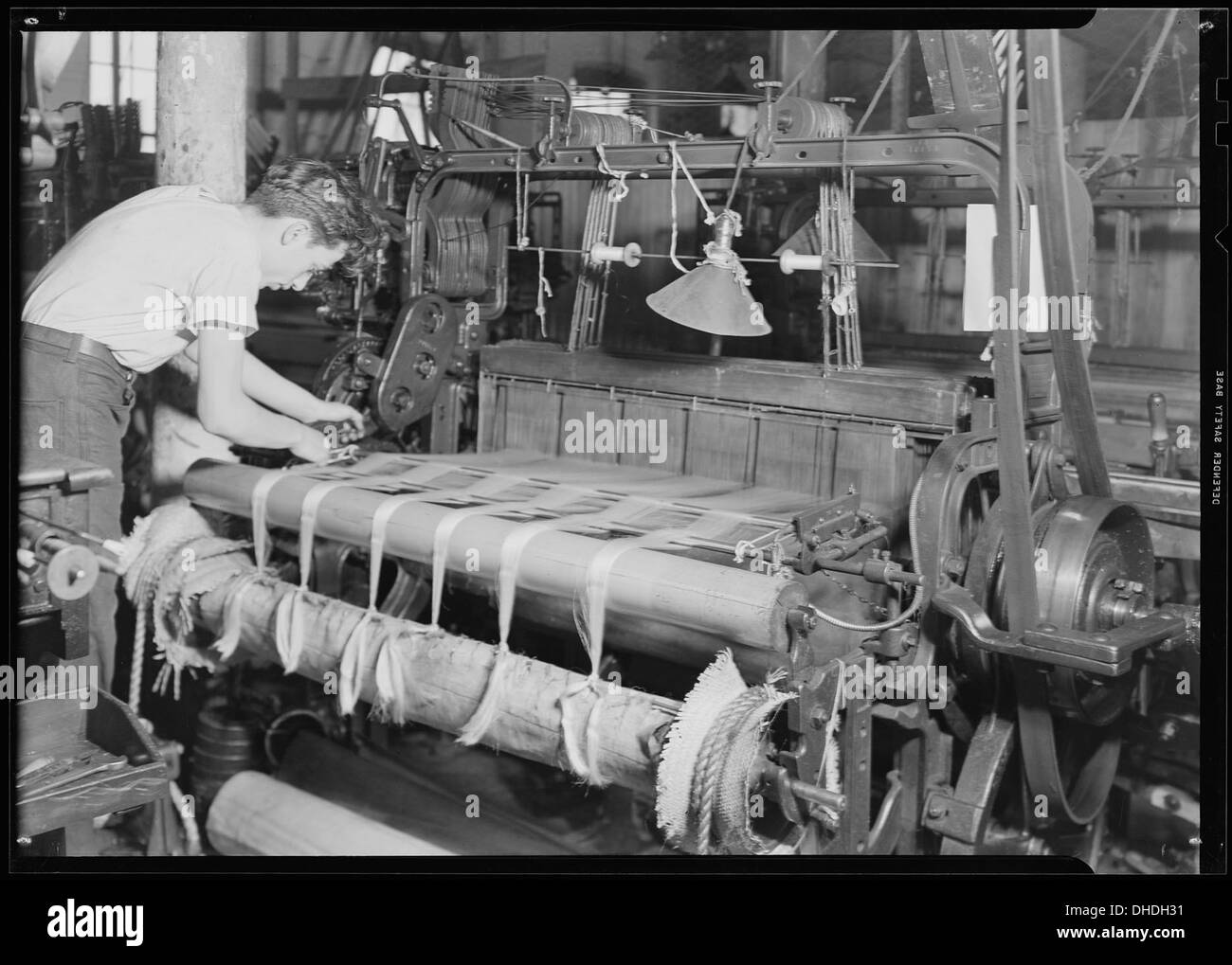 This image from Paterson, New Jersey, shows a textile operator ...