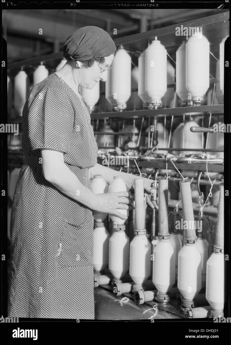The image shows the textile production process at Pacific Mills in ...