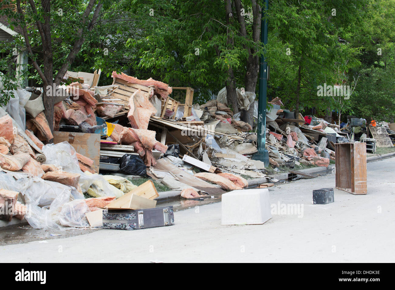 Garbage And Destroyed Household Items Piled Along The Street After A ...