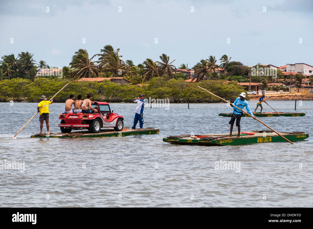 People with sand buggies crossing a river north of Natal, Rio Grande do ...