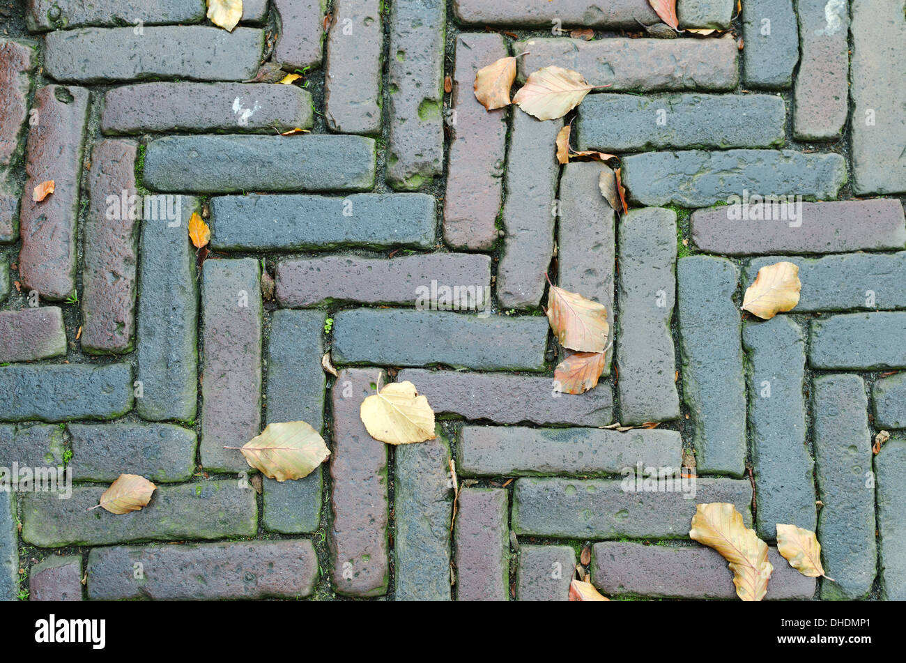 Grungy interlocking brick pavement for textured background Stock Photo ...