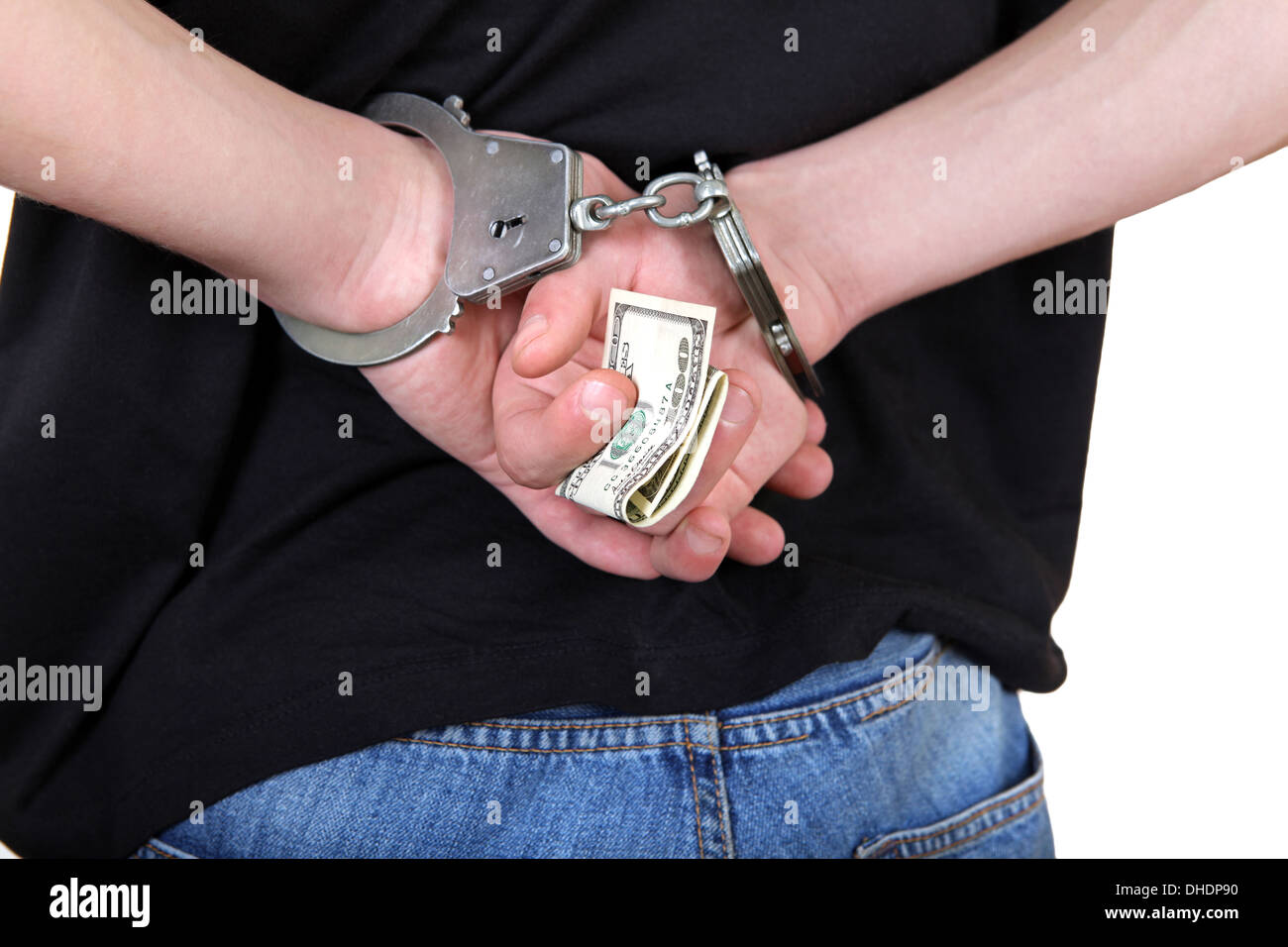 Hands in handcuffs hi-res stock photography and images - Alamy