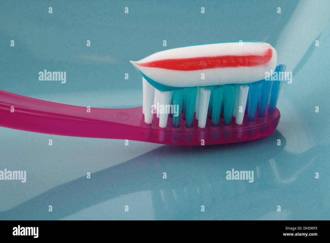 some of toothpaste on a toothbrush Stock Photo - Alamy