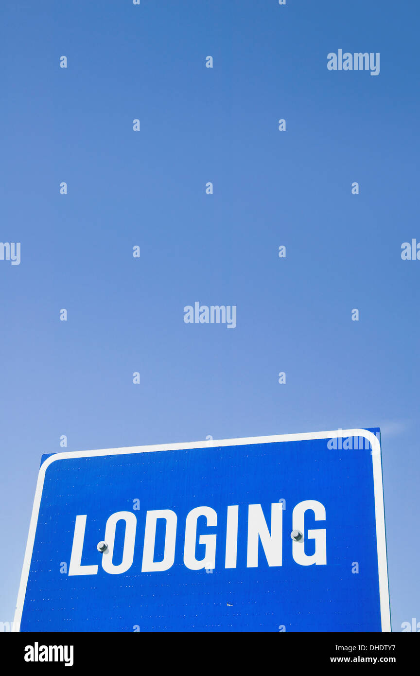 A Blue Sign For Lodging Against A Blue Sky; Canada Stock Photo - Alamy