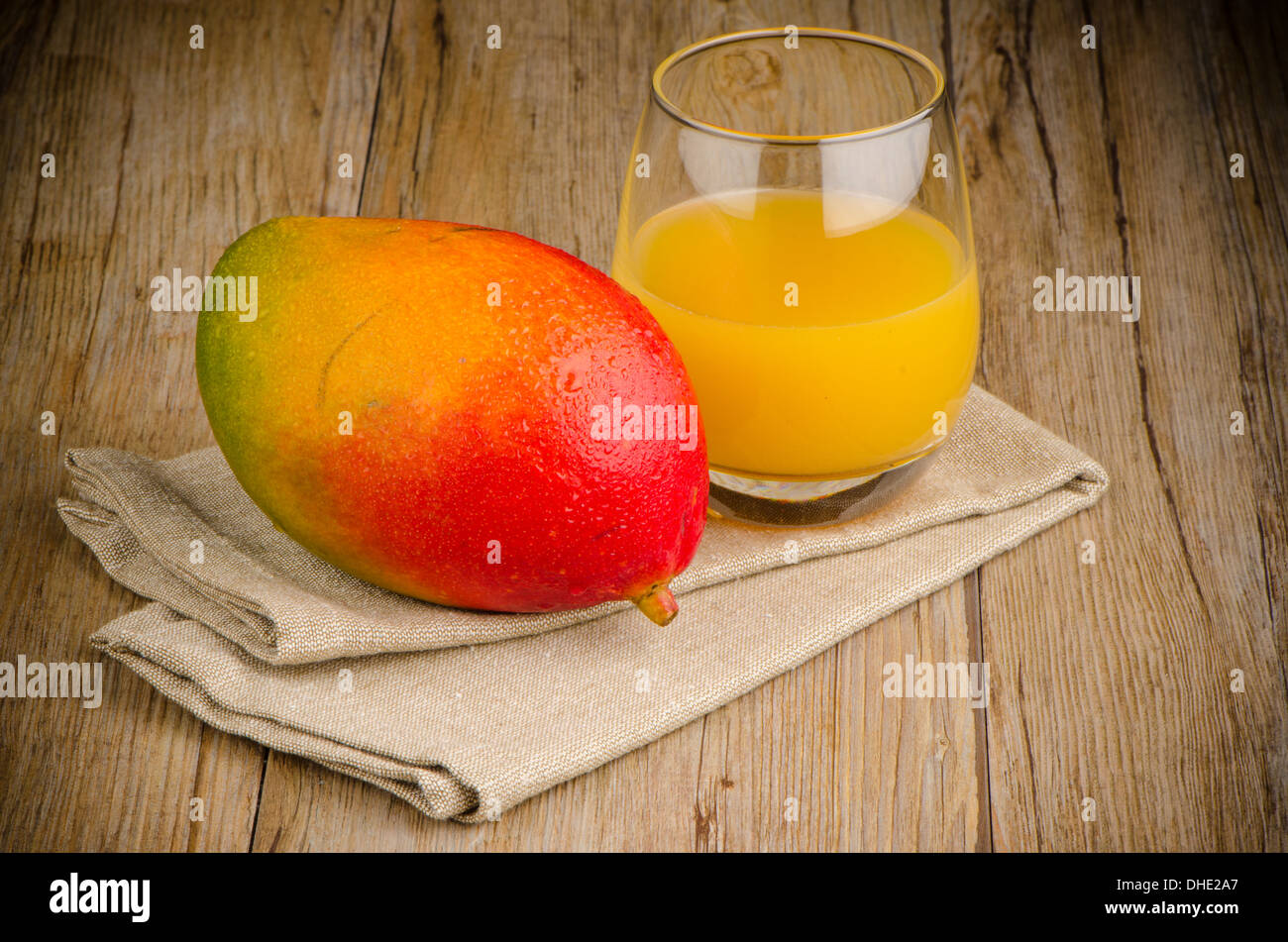 Fresh mango juice and mango fruit Stock Photo - Alamy