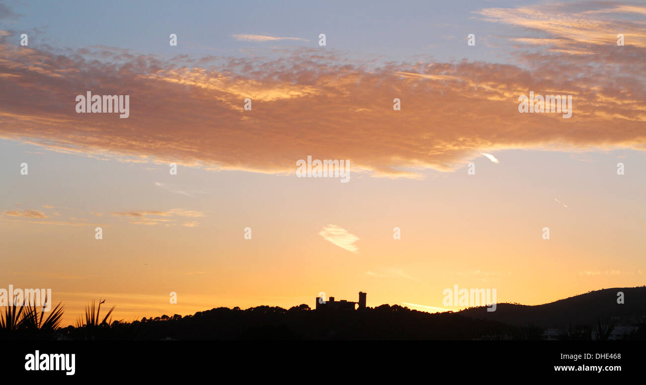 Sunset over Palma de Majorca west hills and its medieval castle, Spain ...