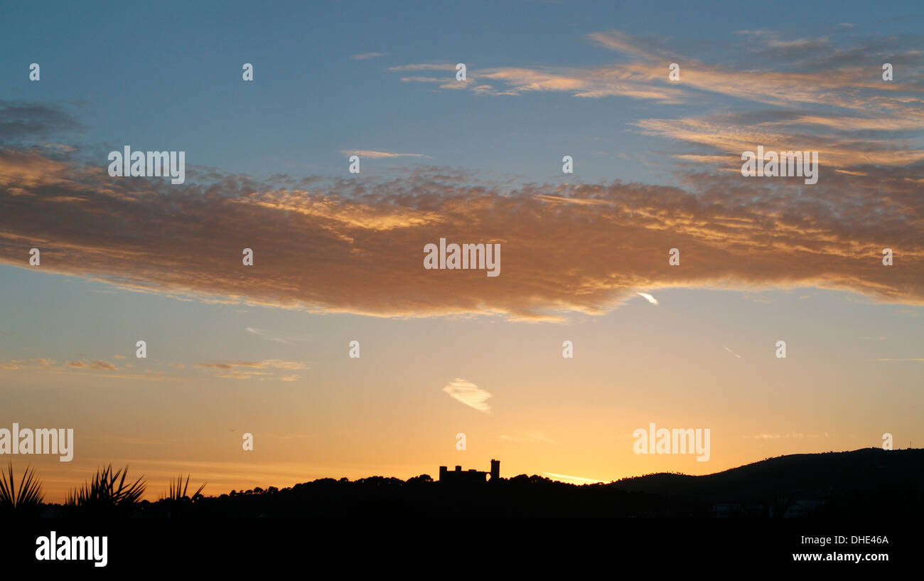 Sunset over Palma de Majorca west hills and its medieval castle, Spain ...