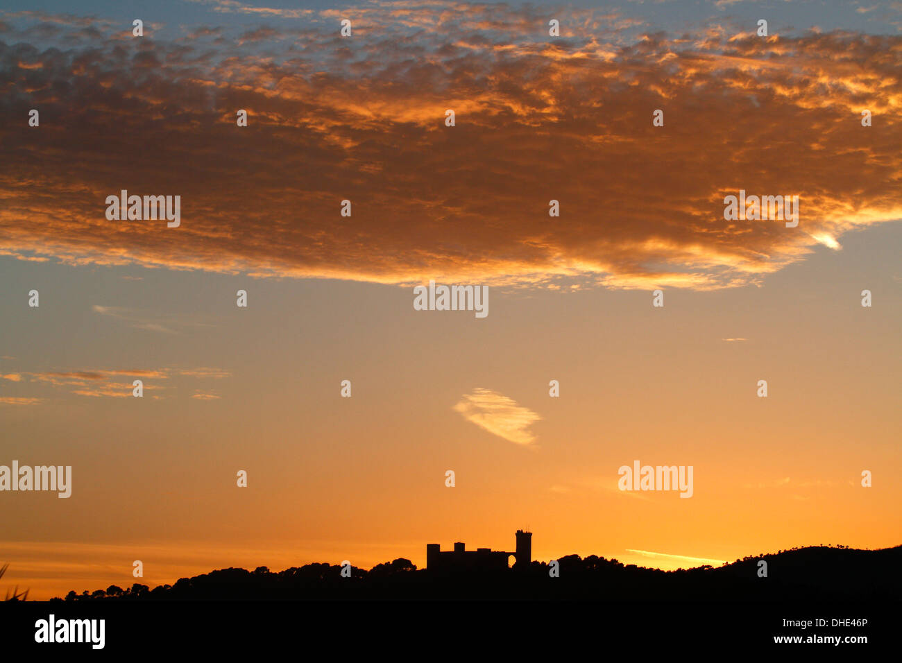 Sunset over Palma de Majorca west hills and its medieval castle, Spain ...