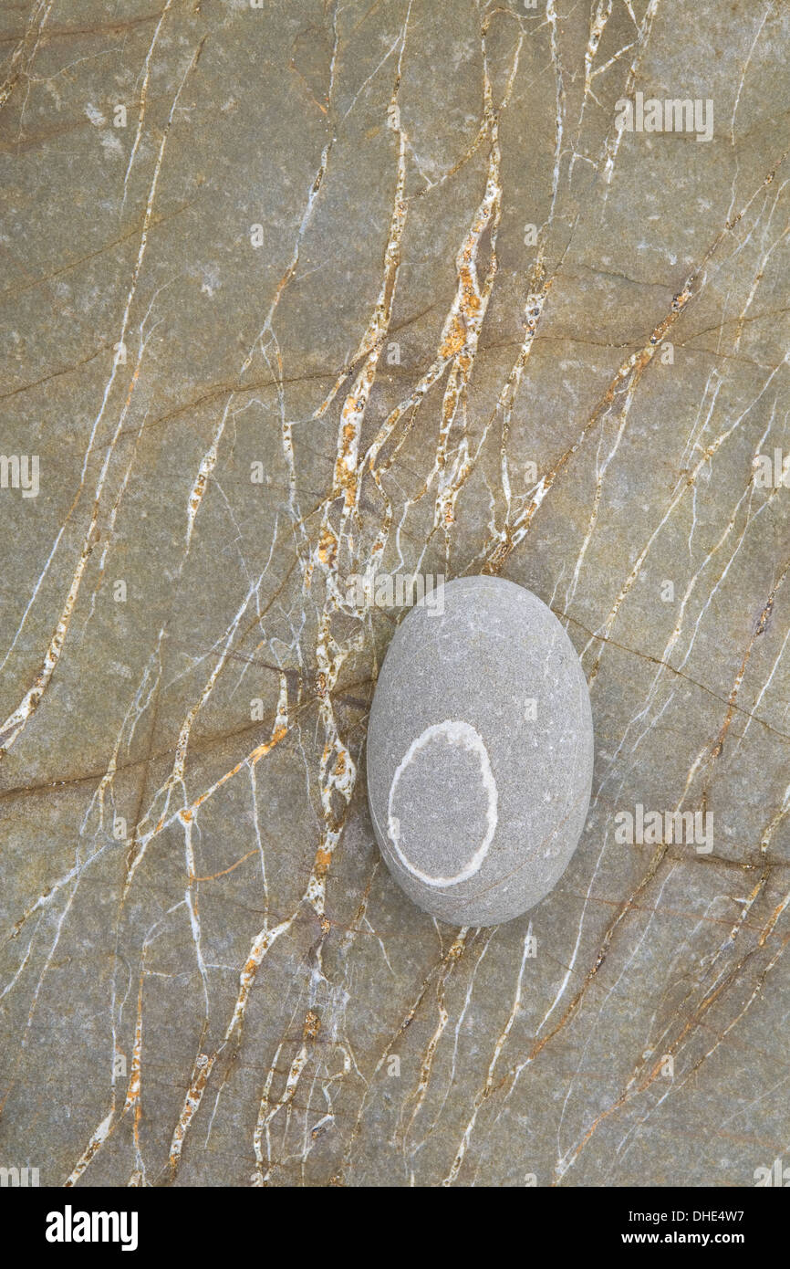 Lines in rock and pebble creating a graphic photograph, Sandymouth ...