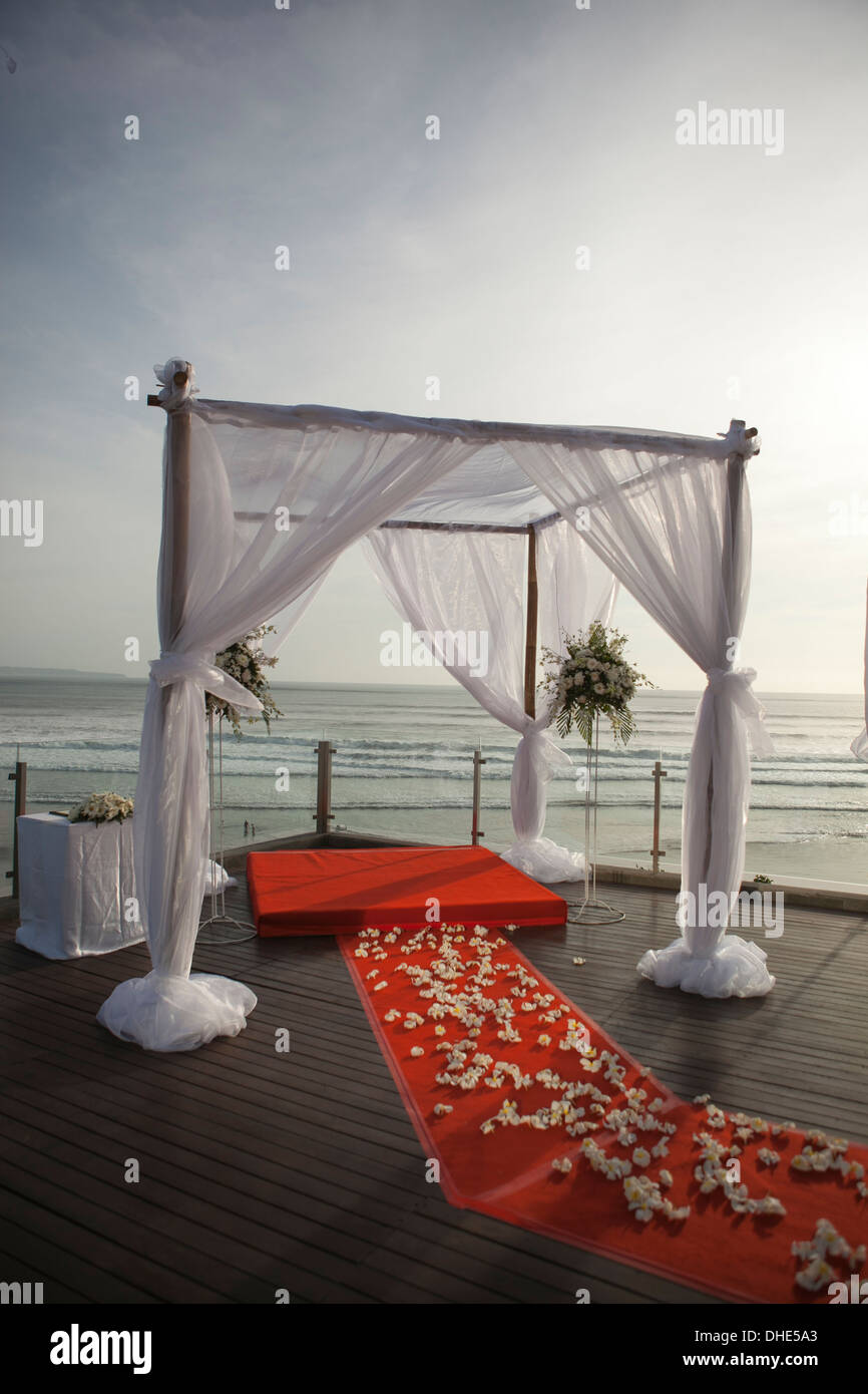 wedding venue setup corridor red flowers decor decoration decorative ...